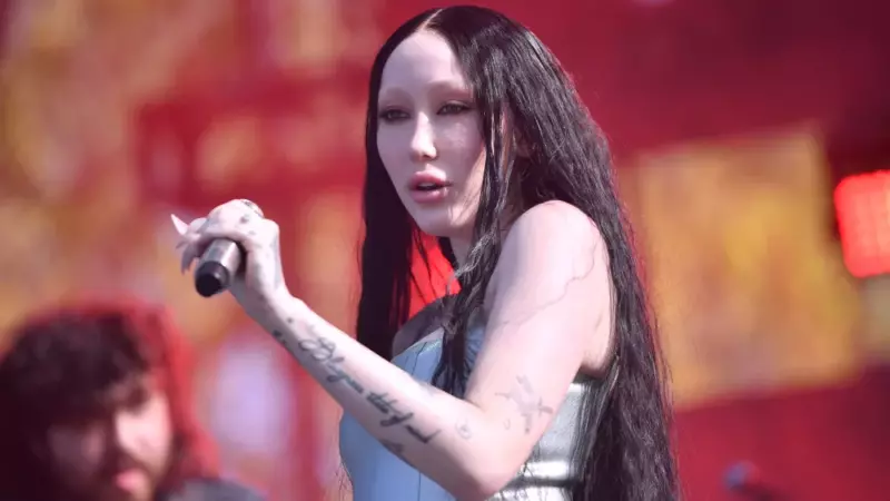 Noah Cyrus looks every bit the pop star as he performs in a silver ...
